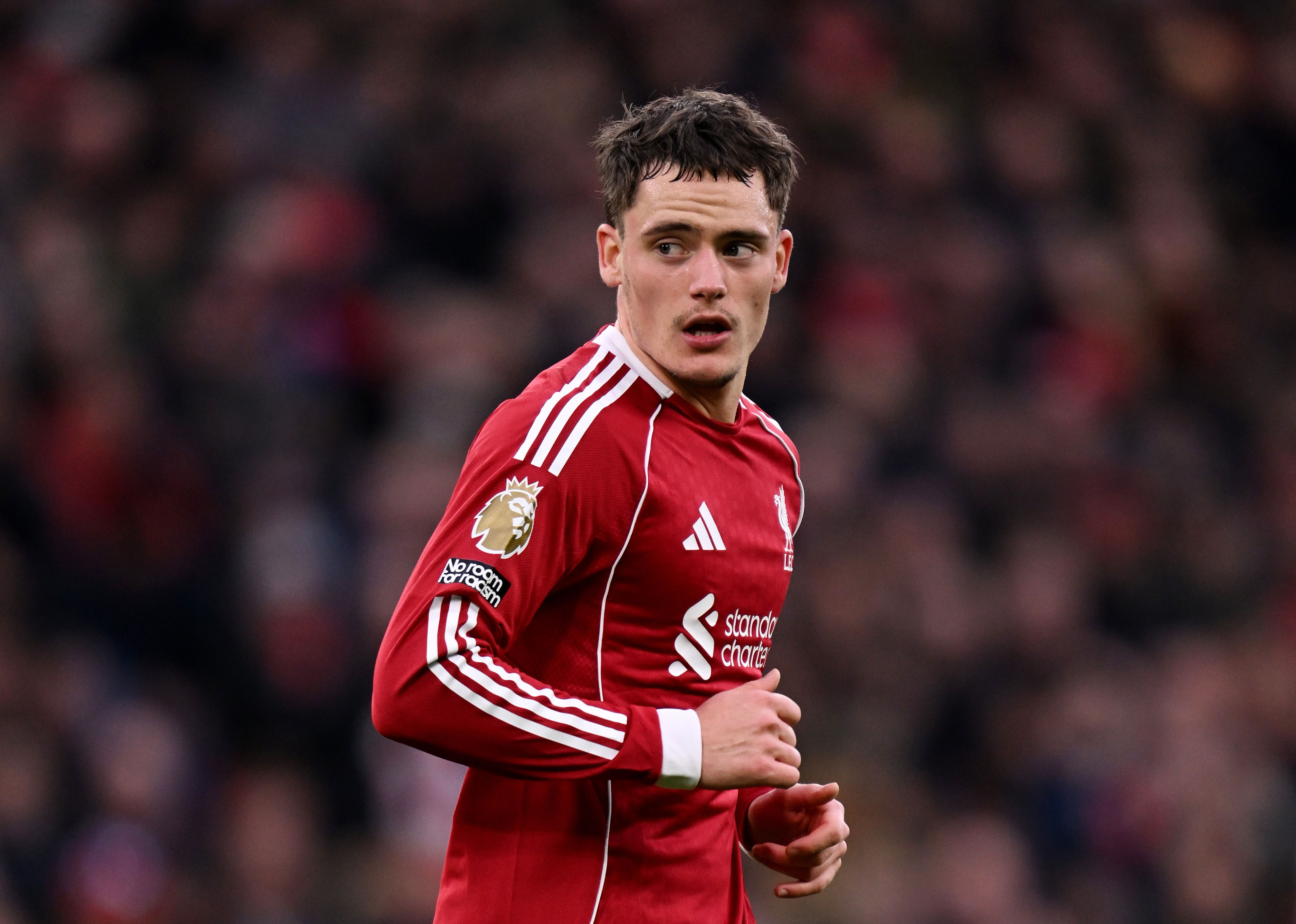 Salah pats badge and applauds fans after possible Liverpool farewell