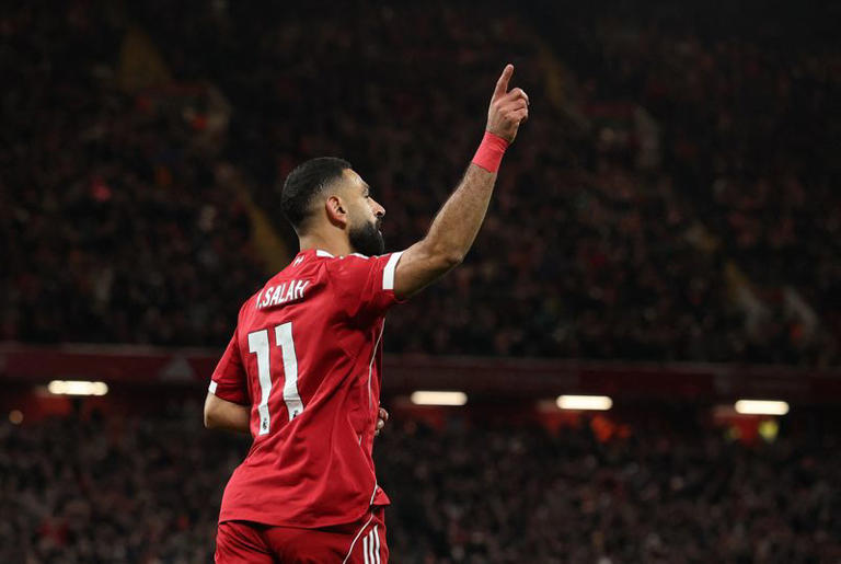 Soccer-Liverpool's Ekitike scores twice, Salah gets warm reception in ...