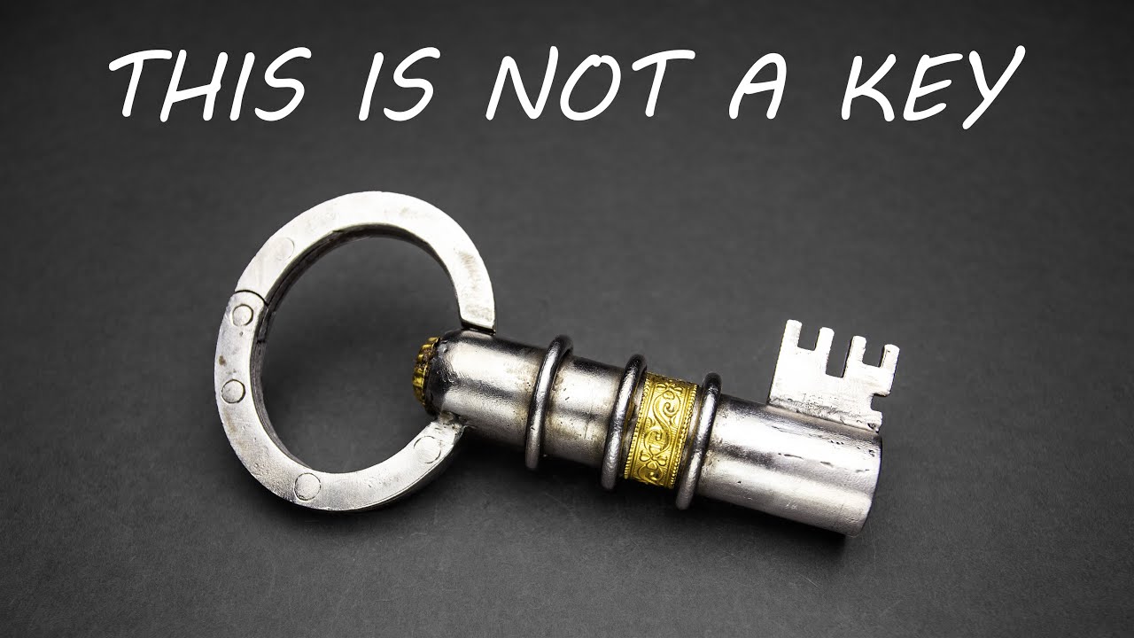 Ancient key shaped puzzle lock