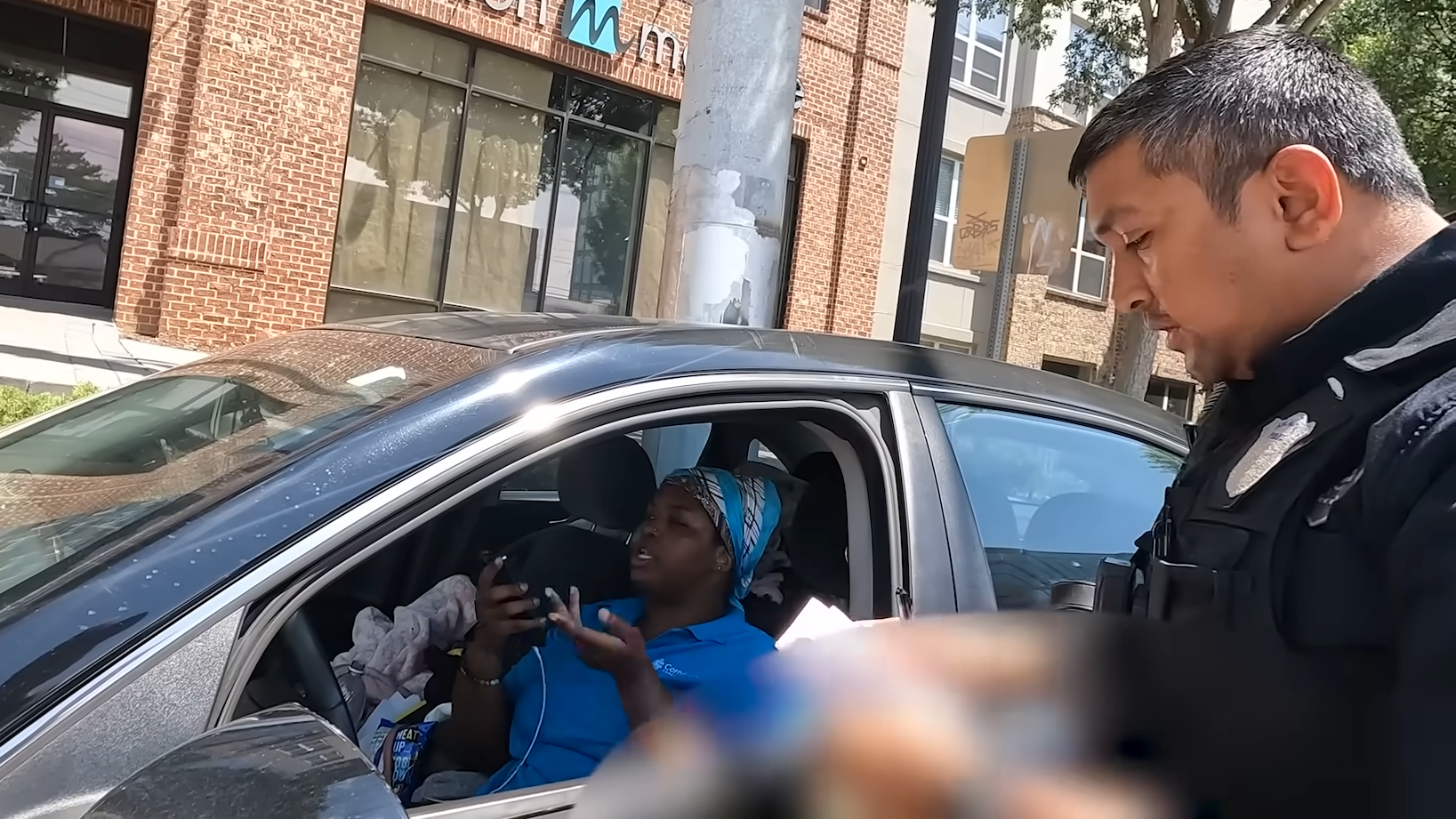 She argued with police, “I have insurance” - the tow went through