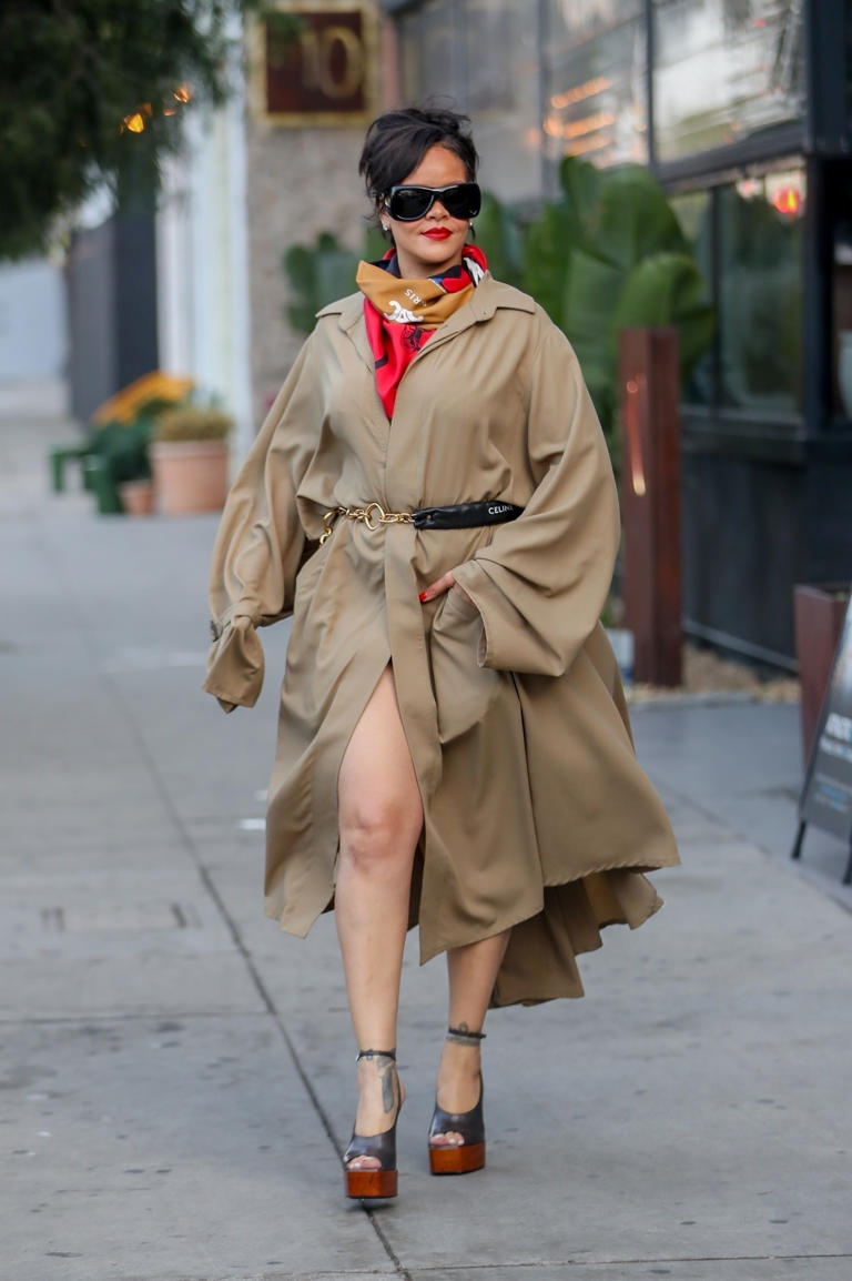 Rihanna trades her duster coat and platform heels for a little black outfit