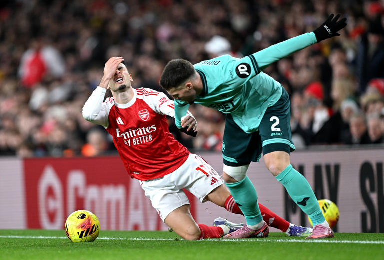 Arsenal require two own goals to beat Premier League strugglers Wolves