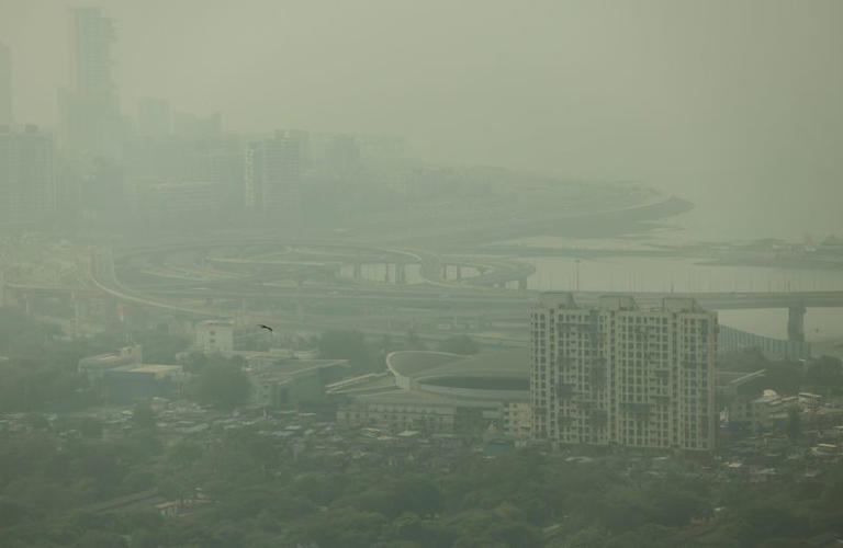 India tightens pollution curbs as Delhi's air quality worsens