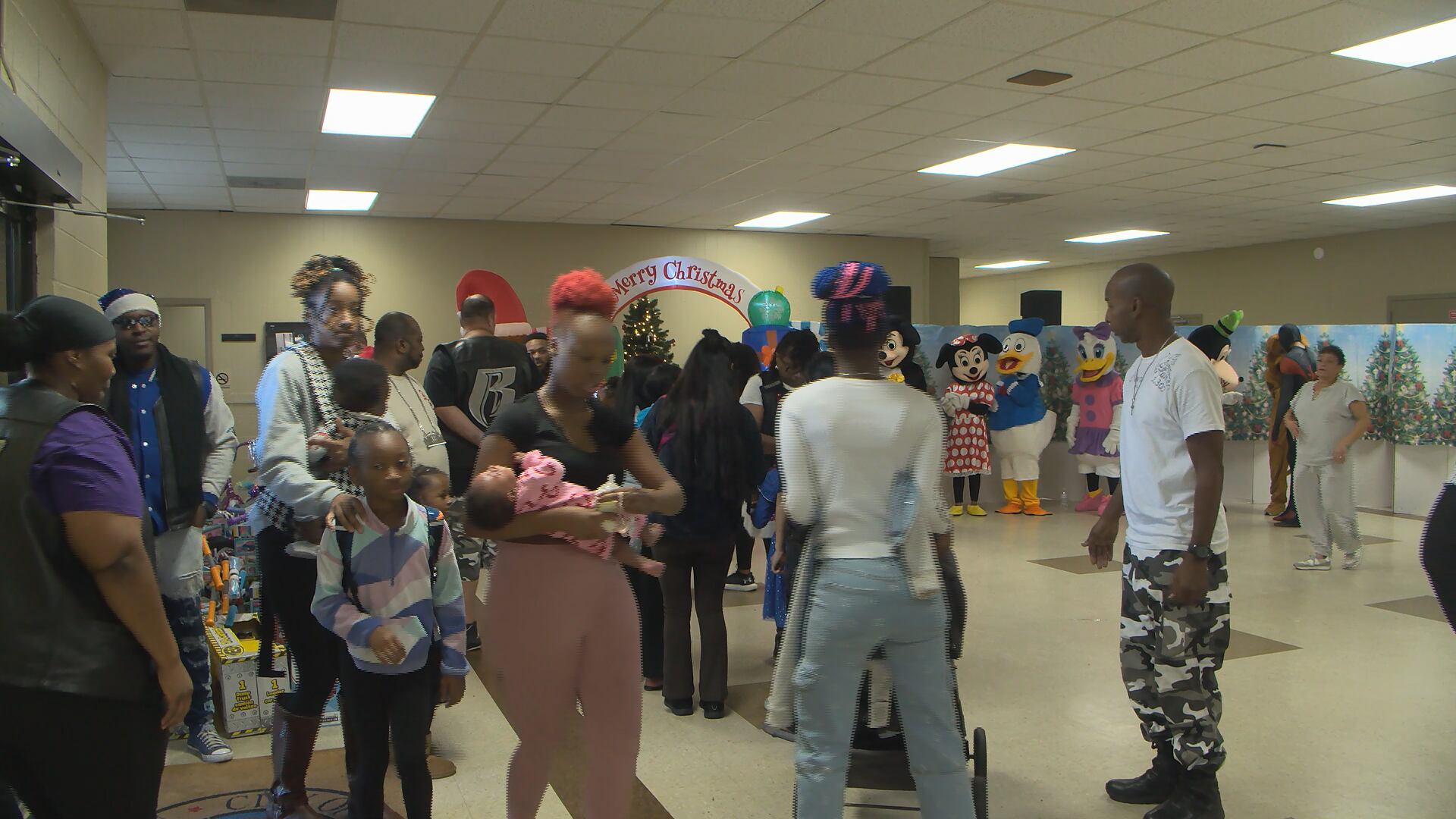 More than 400 children presented with Christmas gifts Saturday during ...
