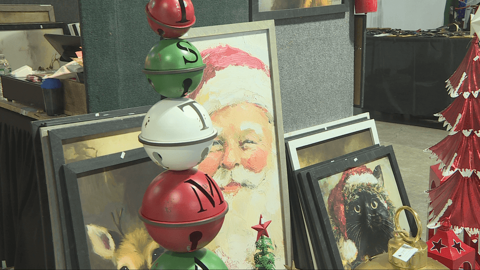 Laughter fills the air while shoppers stuff stockings at Christmas ...