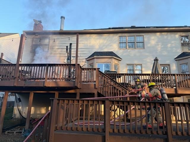 Fire officials: Smoking materials in flower pot likely caused deck fire