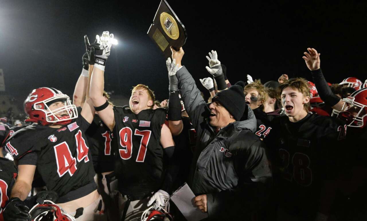 Top-ranked New Canaan football stuffs Cheshire for perfect season, CIAC ...