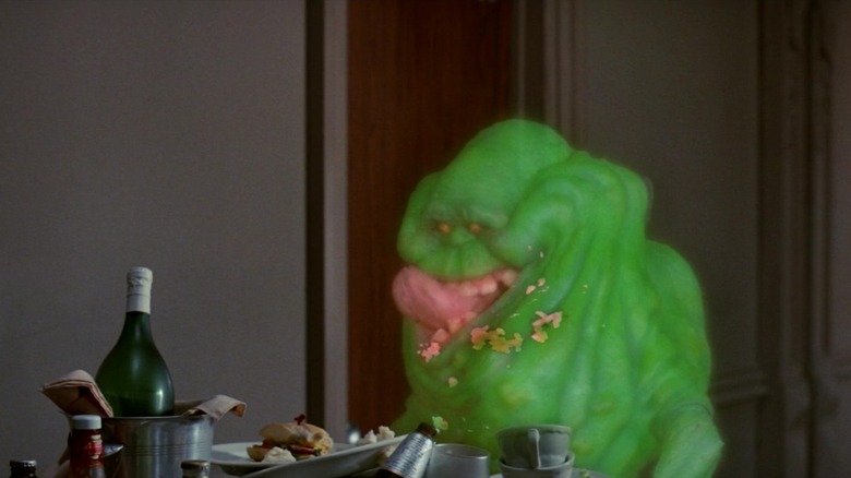 Dan Aykroyd imagined Ghostbusters' Slimer as the spirit of a deceased ...