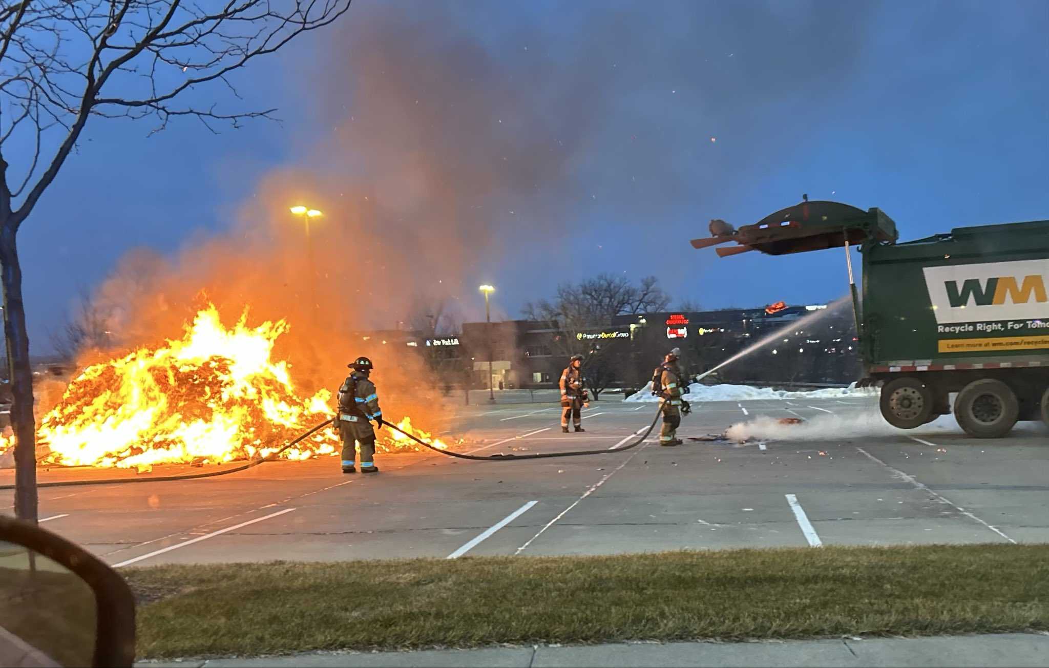 Omaha firefighters battle massive flames after trash fire ignites in ...