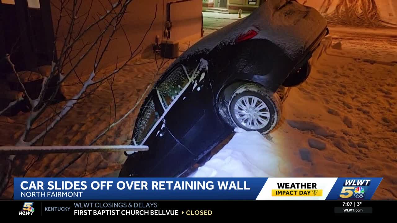 Car slides on slick Cincinnati roads, over retaining wall in North ...