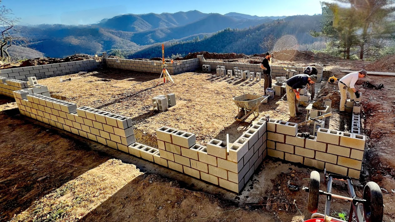 Building a house: Bolts, stucco, and backfill