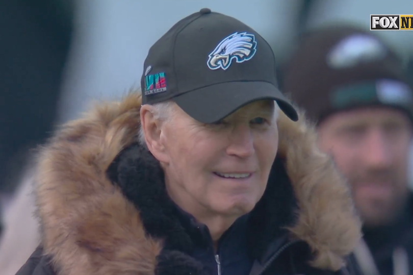 Joe Biden spotted bundled up on Eagles sideline as he offers support to ...