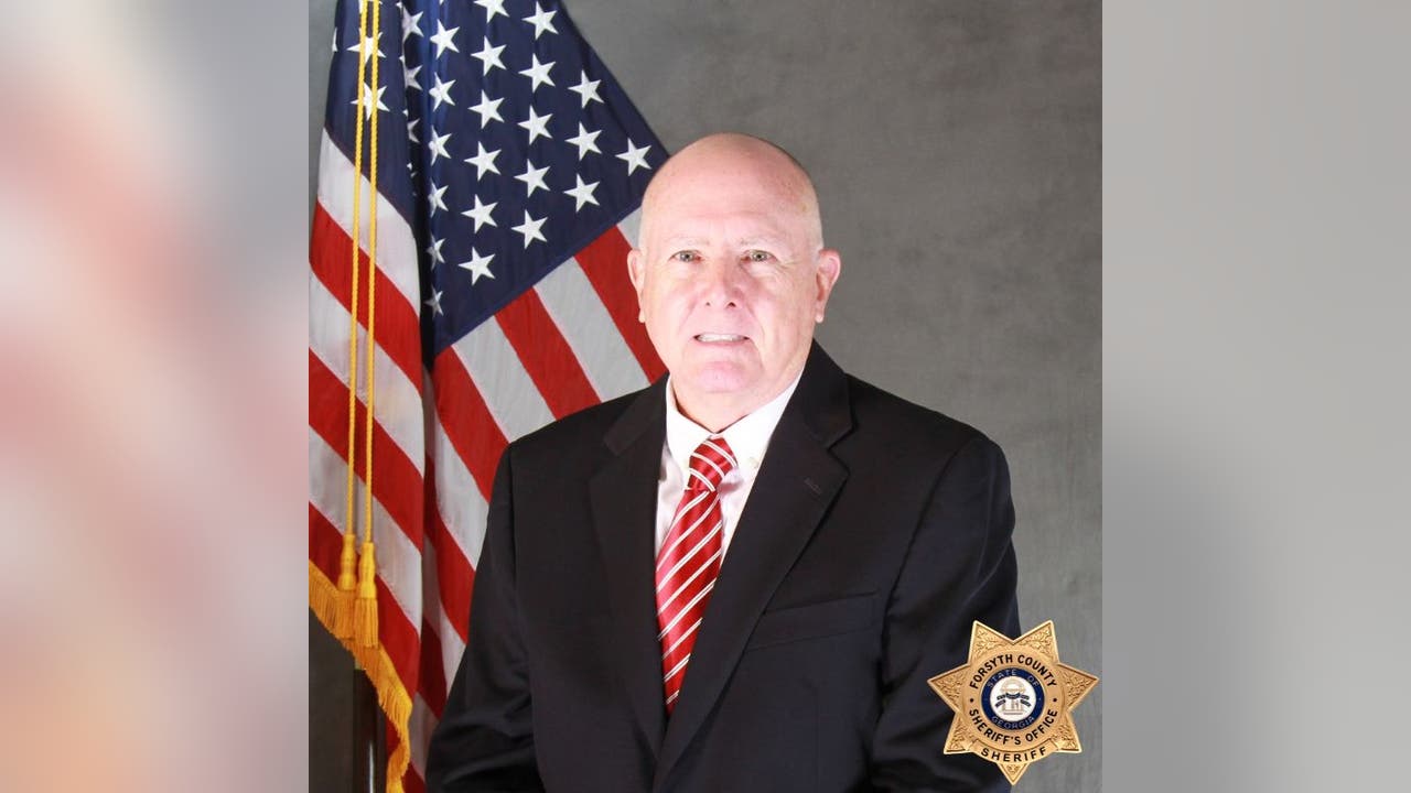 Retired officer killed while directing traffic at Cumming Christmas parade