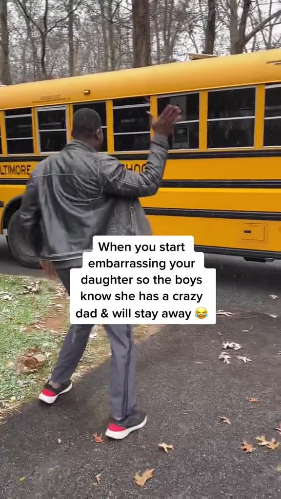 Dad embarrasses daughter at the bus stop to keep boys away