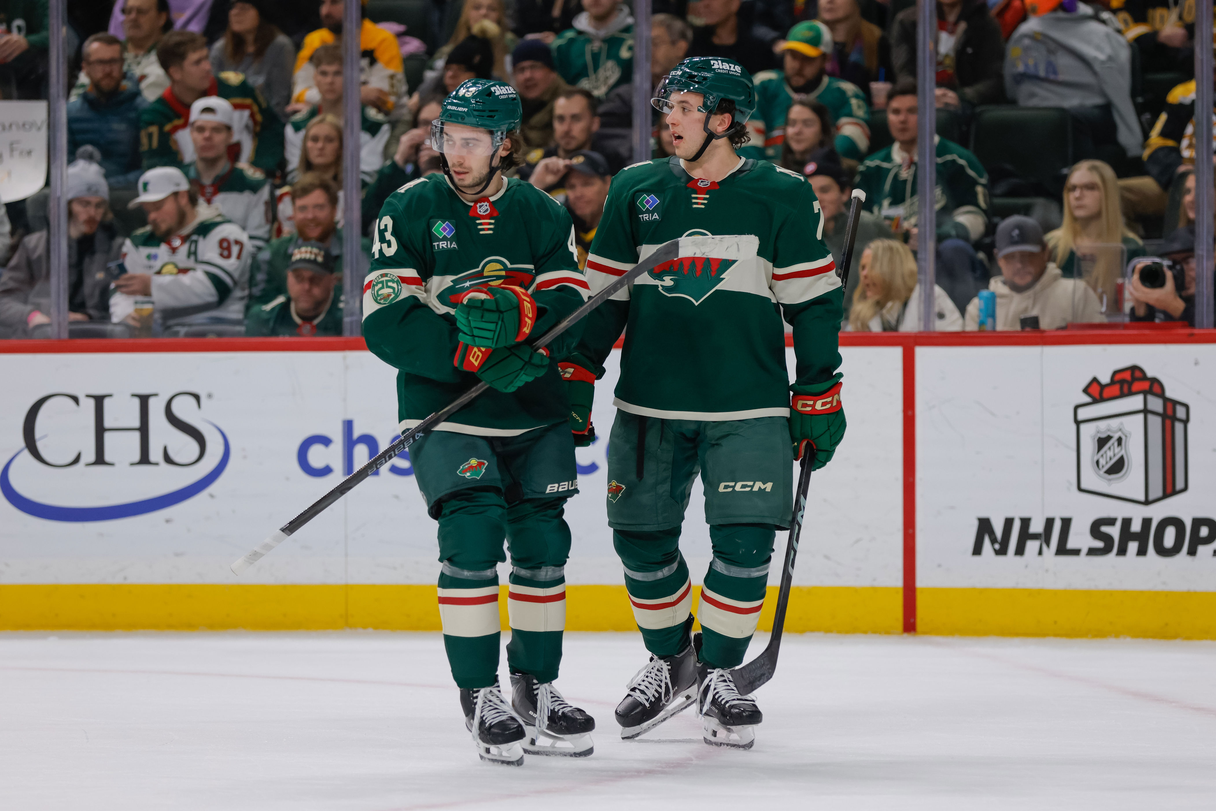Quinn Hughes scores in Minnesota debut as Wild beat Bruins 6-2 for 4th ...