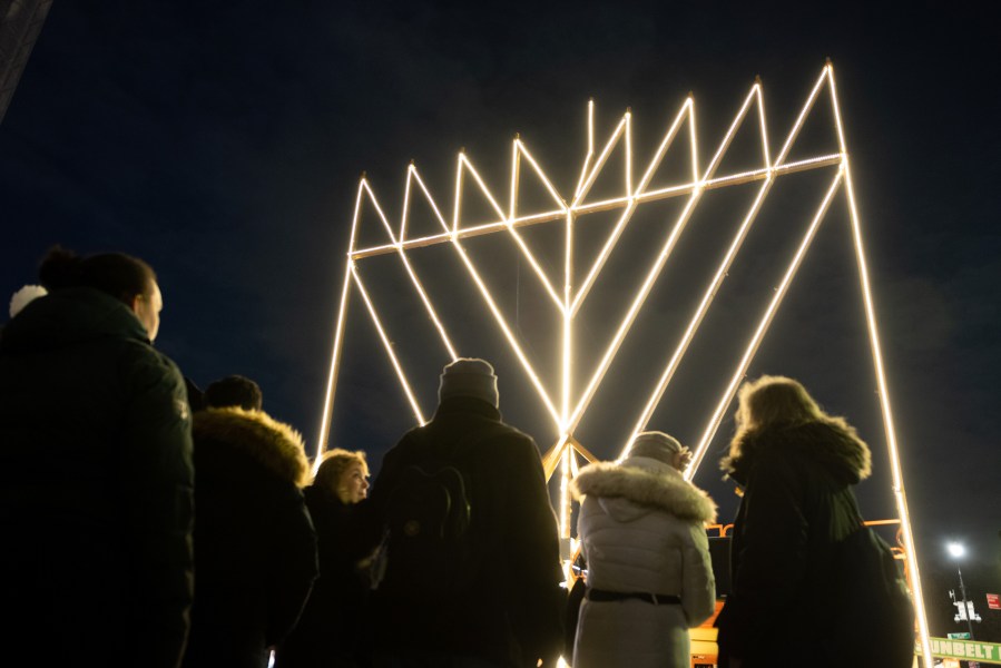 Jewish New Yorkers celebrate first night of Hanukkah with heartbreak ...
