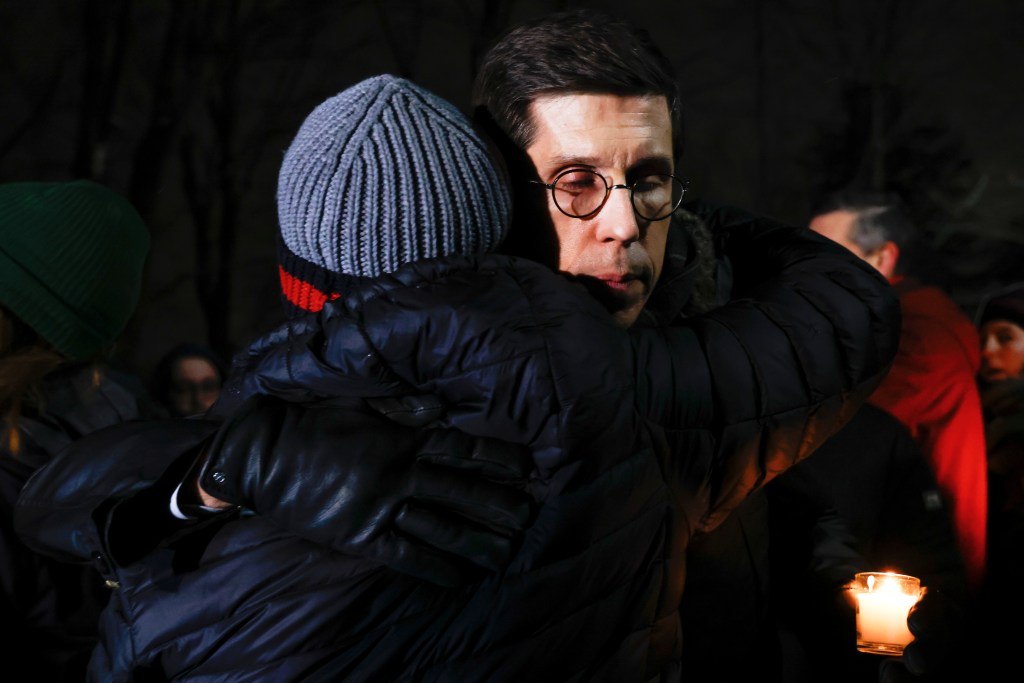 Brown University shooting victims honored at Providence community vigil