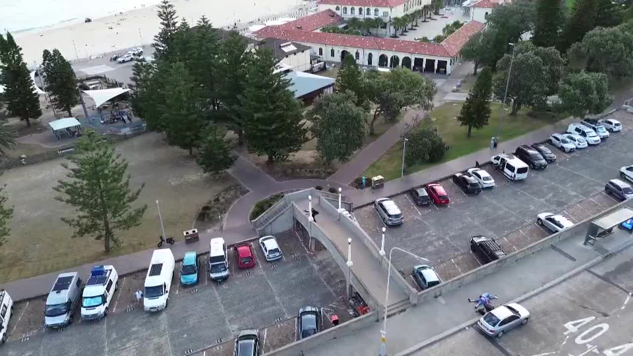 Video: Drone footage shows Bondi Beach shooter on bridge amid police ...