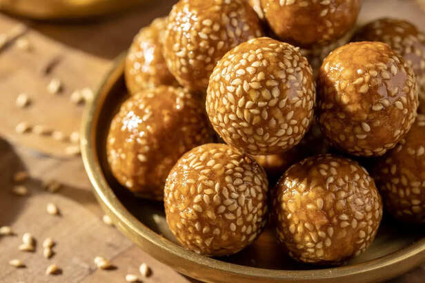 Start the winter season with tasty til pitha - easy recipe inside