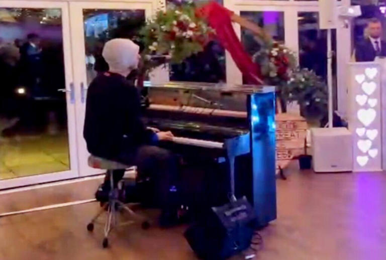 Chris Martin surprises couple by performing wedding first dance