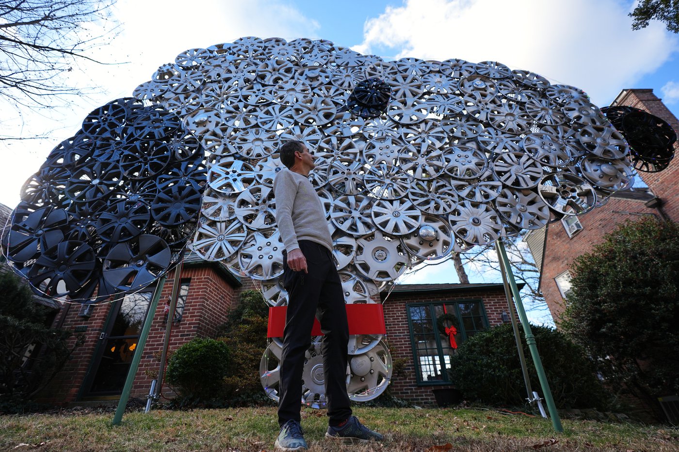 Baltimore cyclist finds joy in collecting lost hubcaps and stringing ...