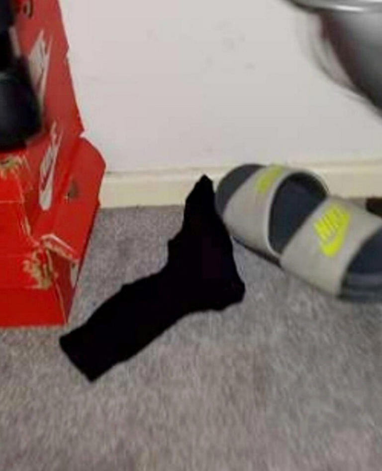 Moment police bust drug dealer and find gun stuffed in a sock