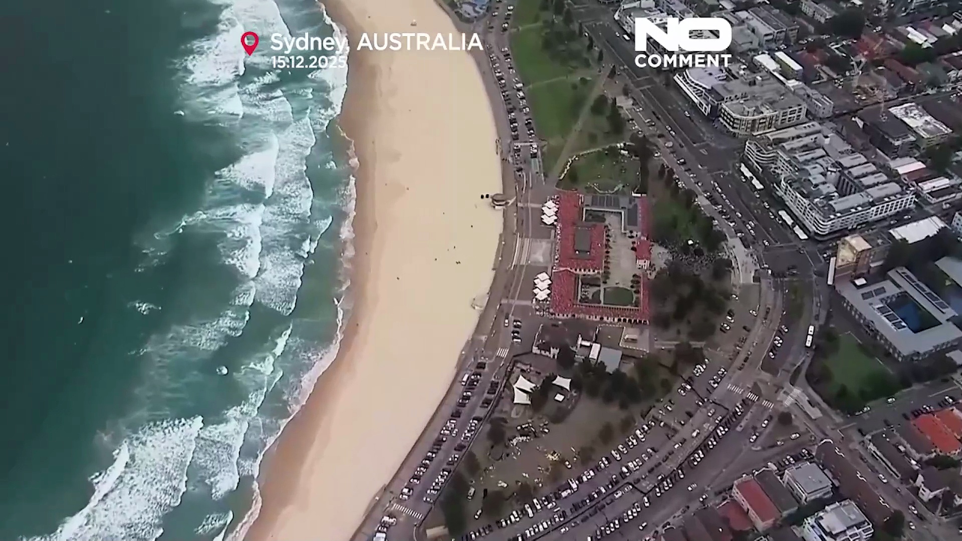 Hundreds gather to lay flowers at the site of the deadly Bondi Beach ...