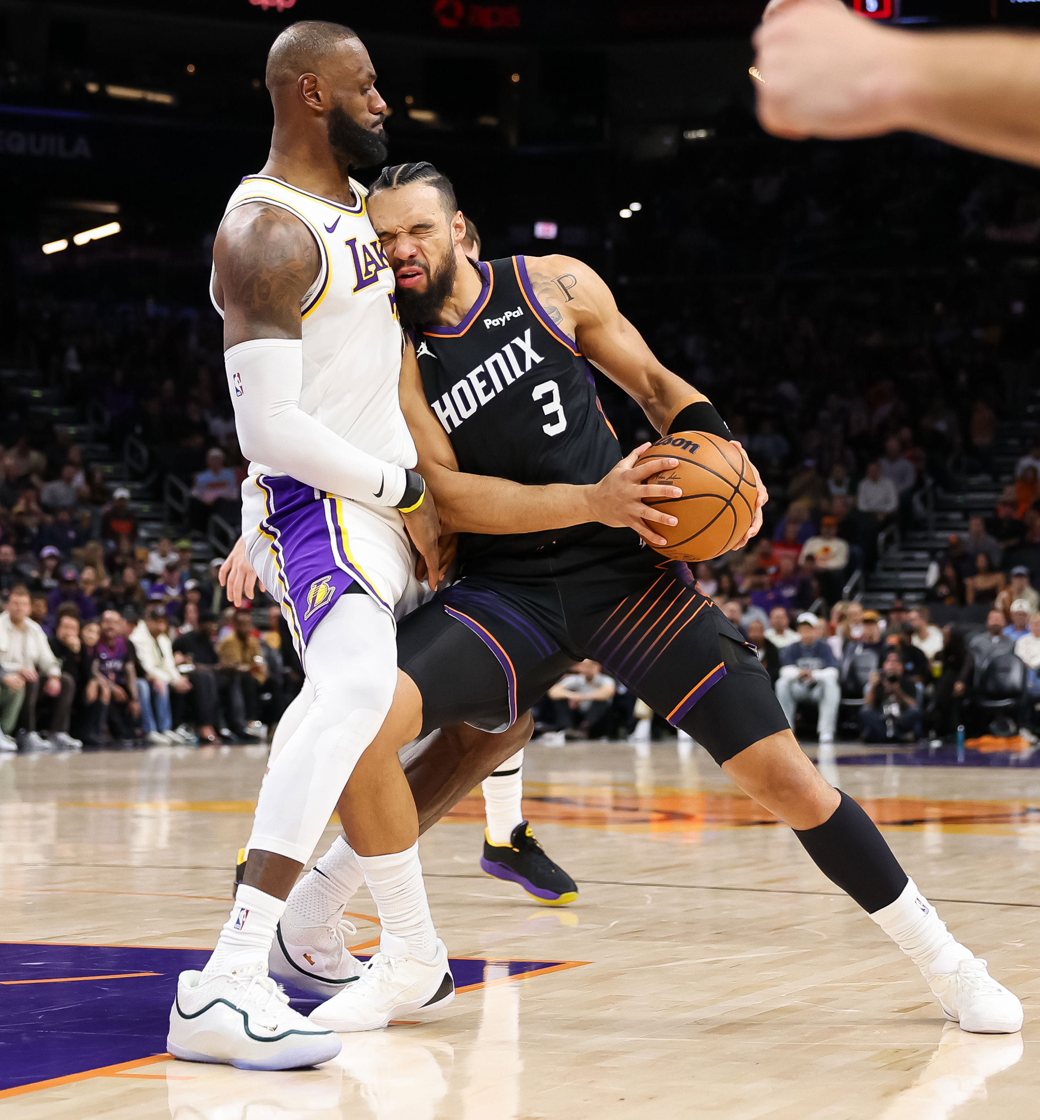 Suns claw back from 20 down but fall short in a mucky game