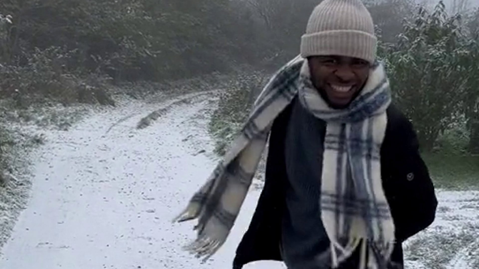 Adorable moment man, 27, sees snow for the first time