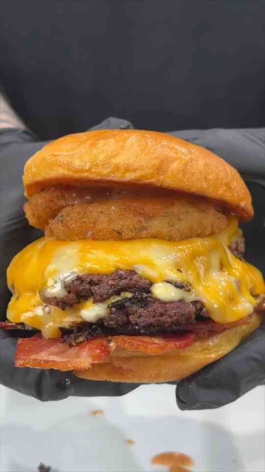 Watch the crispiest double stack smashburger come together