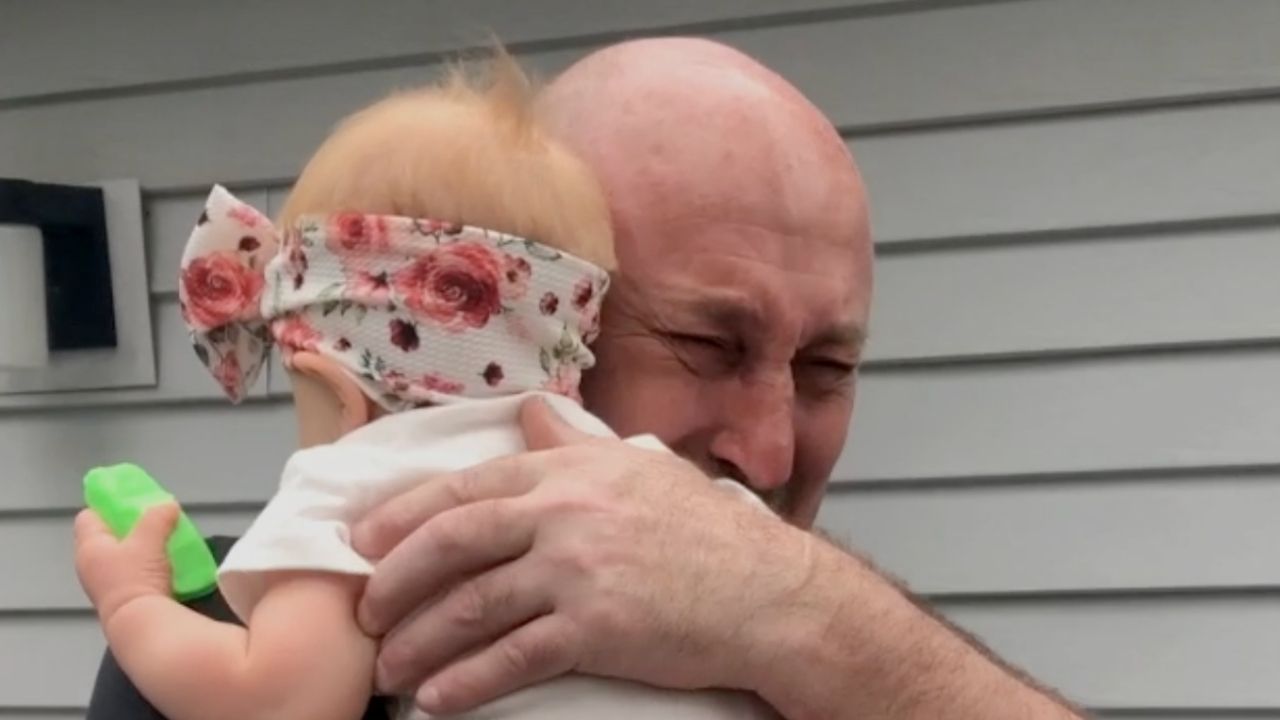 First time grandfather meets granddaughter after 10 month wait ...