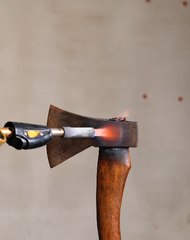 Made a sleek, upgraded axe by combining two old axes together