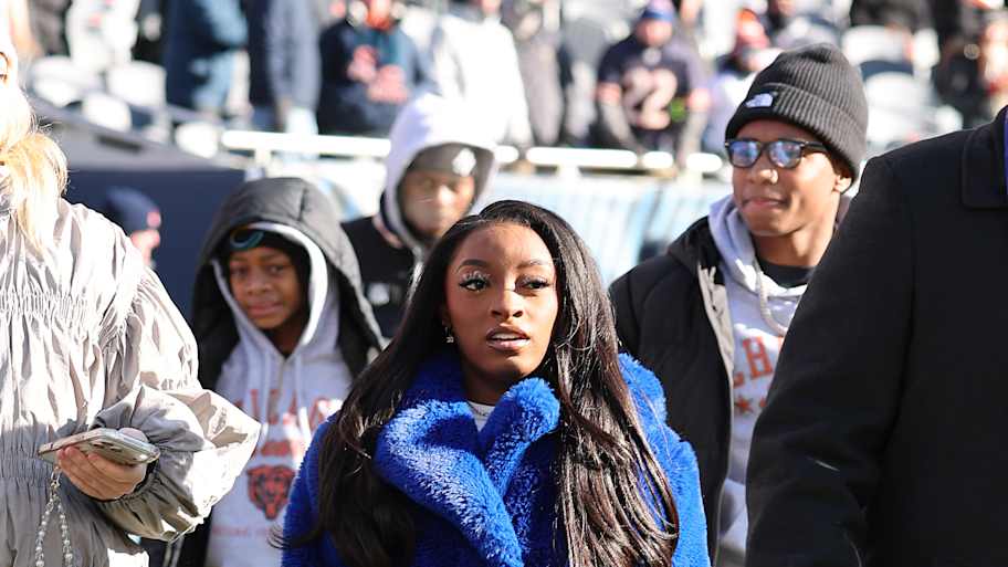 Simone Biles rocks custom fur coat while cheering on husband Jonathan Owens