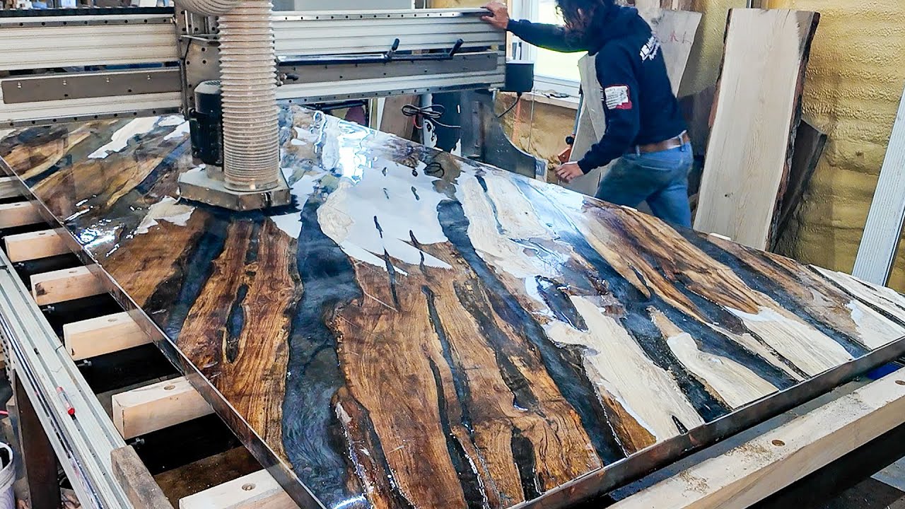 Flattening a giant table top and picking up giant logs