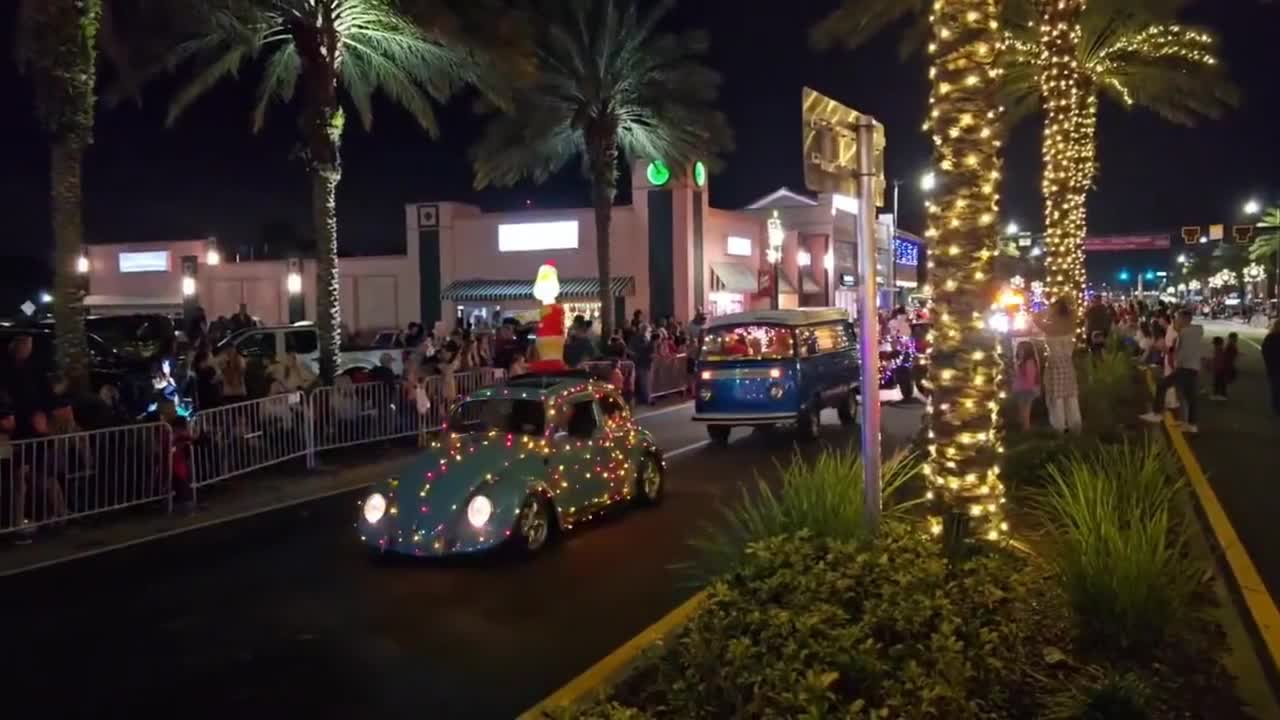 Festive nighttime Christmas parade lights up Lake Worth Beach, USA