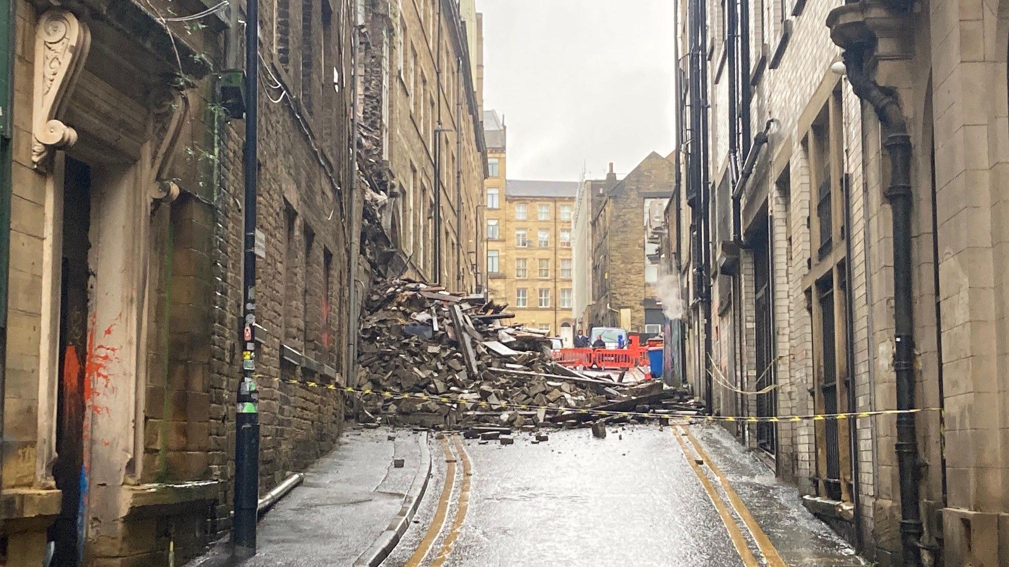 Derelict city building collapse sparks evacuation
