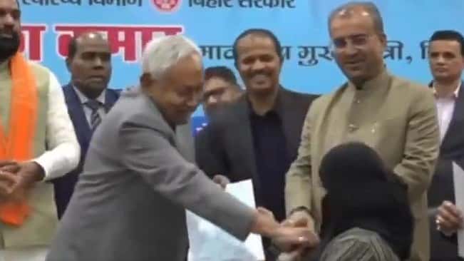 Nitish Kumar pulls down doctor's hijab at event, opposition questions ...
