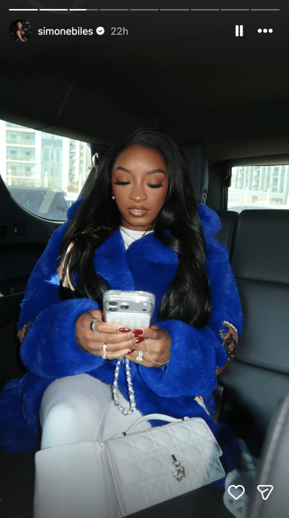 Simone Biles has a cute PDA moment with her husband - but OMG, that coat
