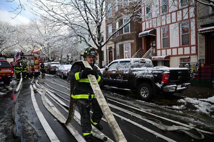Firefighters battle Brooklyn house fire as blocked hydrant, freezing ...