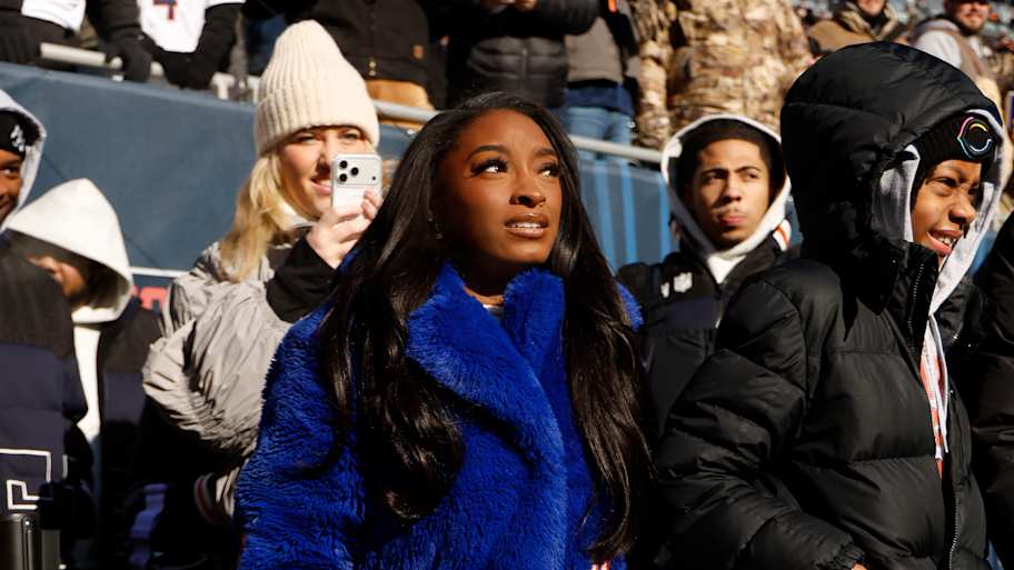 Simone Biles rocks custom fur coat while cheering on husband Jonathan Owens