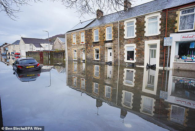 Flood and 'do not travel' alerts issued after half a month's rain falls ...