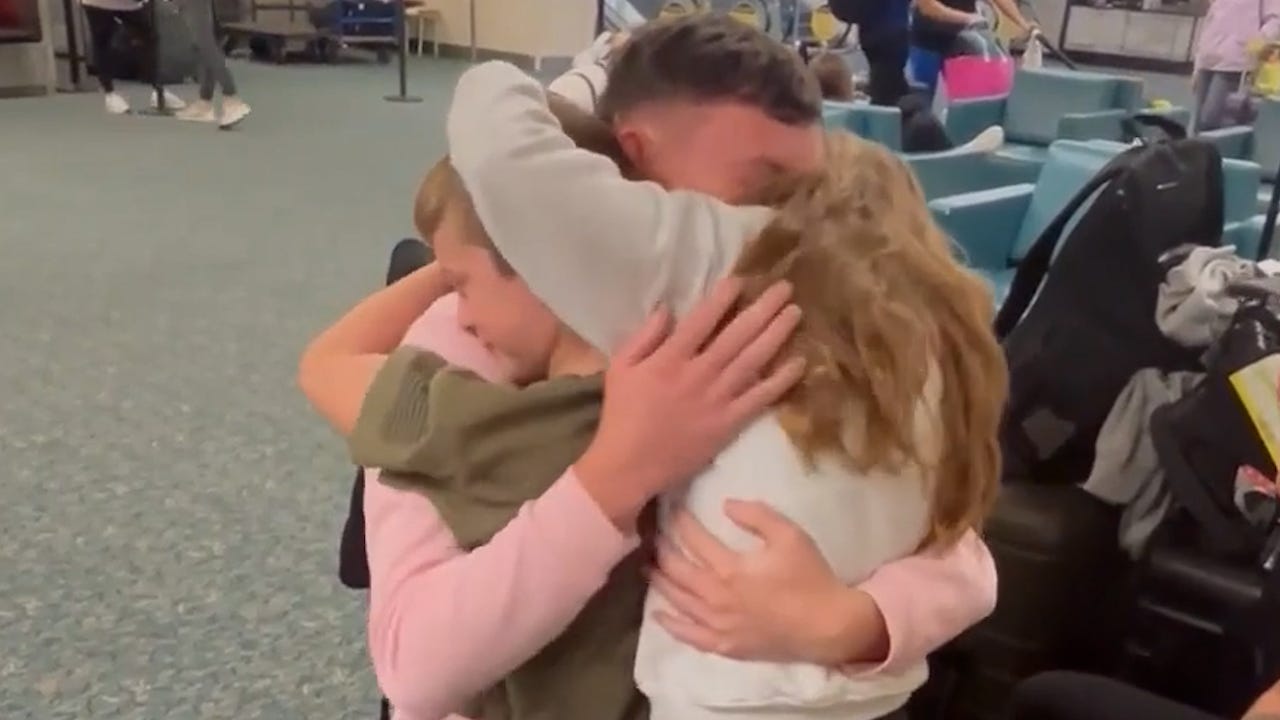 Air Force brother shocks younger siblings with emotional airport reunion