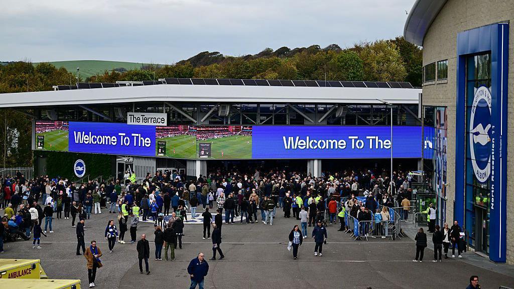 Brighton U-turn over tribute wall after fan anger