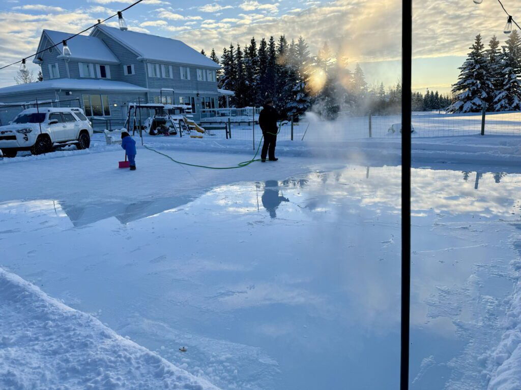Family transform backyard into DIY ice rink
