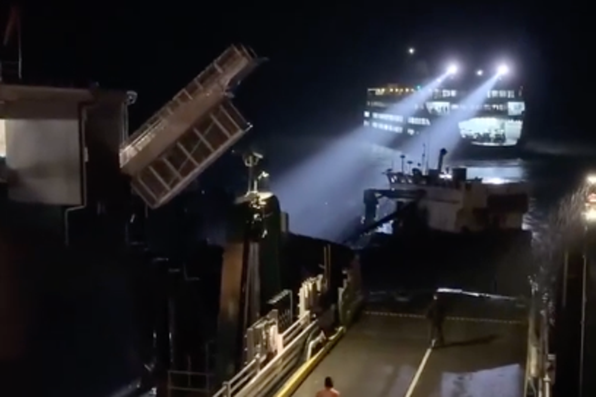 Moment 100-ft crewless 'ghost boat' drifts through ferry terminal