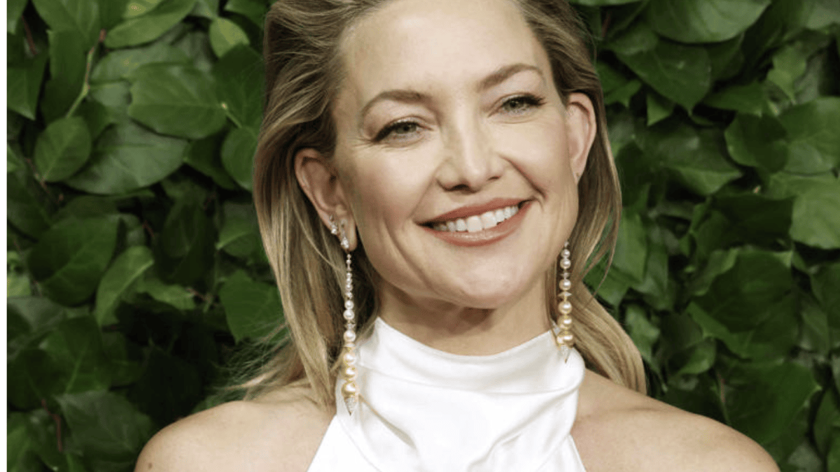 Kate Hudson pairs sheer sweater with a skirt in literal tatters