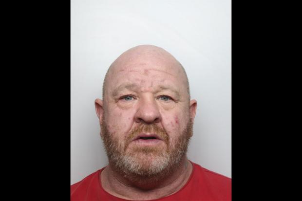 Face revealed of thug who threatened neighbour with knife