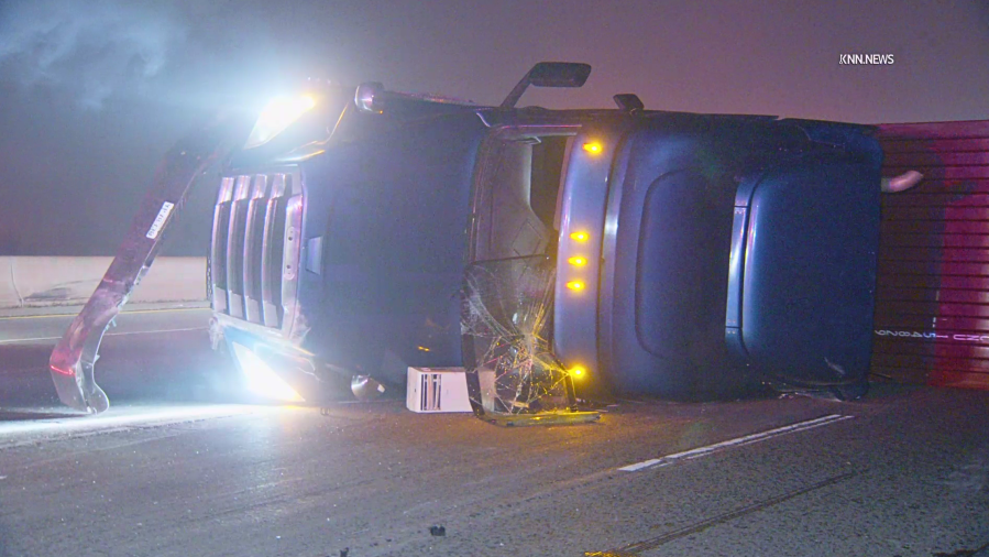 Big rig overturns on 91 Freeway in Anaheim, blocking multiple lanes