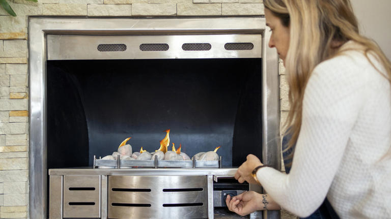 How to update a wood-burning fireplace to gas and why you'd want to