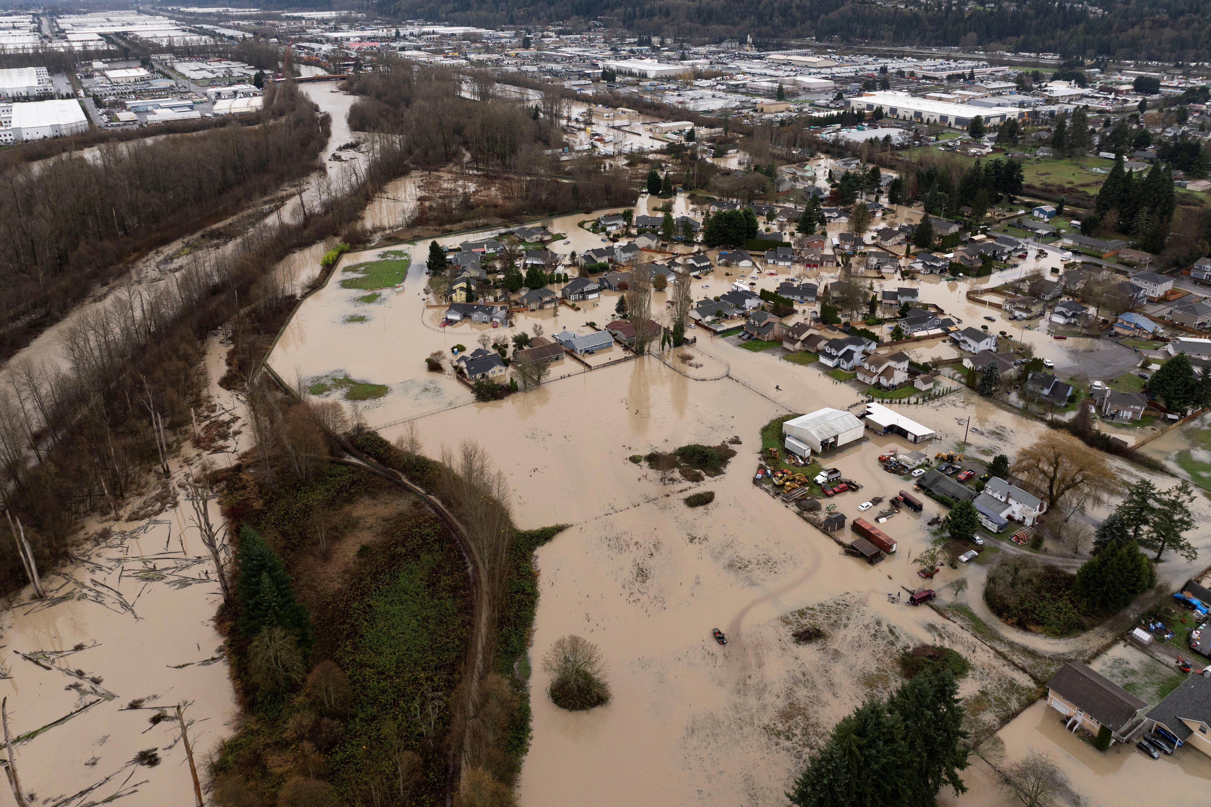 Driver found dead amid flash flooding, levee failures in Washington